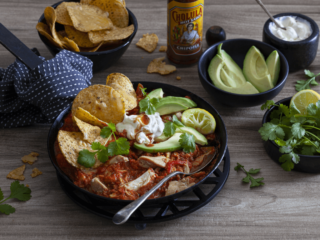 Tex Mex Style Roast Chicken Nachos with Sour Cream and Avocado